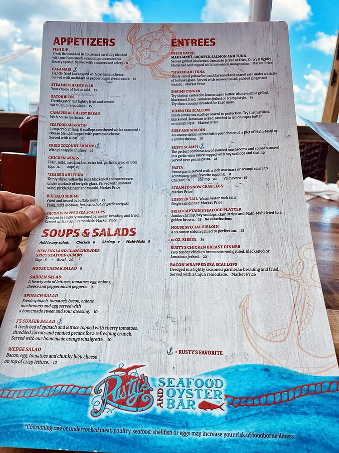A menu that reads like a love letter to the ocean. Each description promises maritime delights that make choosing just one item nearly impossible.