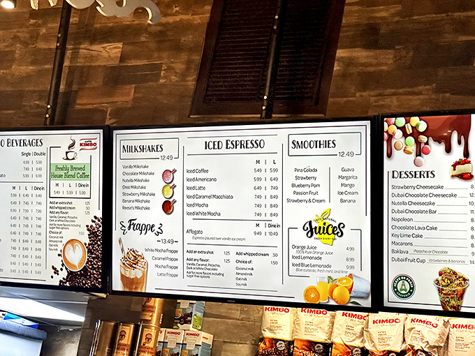 The menu board reads like a love letter to caffeine enthusiasts, with enough options to keep you caffeinated through a theme park marathon.