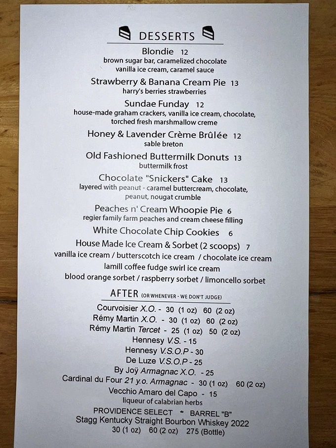 The dessert menu reads like a love letter to comfort&mdash;that "Snickers" cake isn't just dessert, it's therapy with a fork.