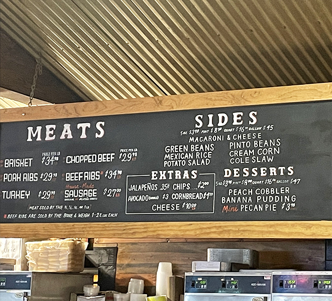 The menu board tells a simple truth: meat is the star here. No fancy descriptions needed when your brisket has already achieved legendary status in the barbecue universe.