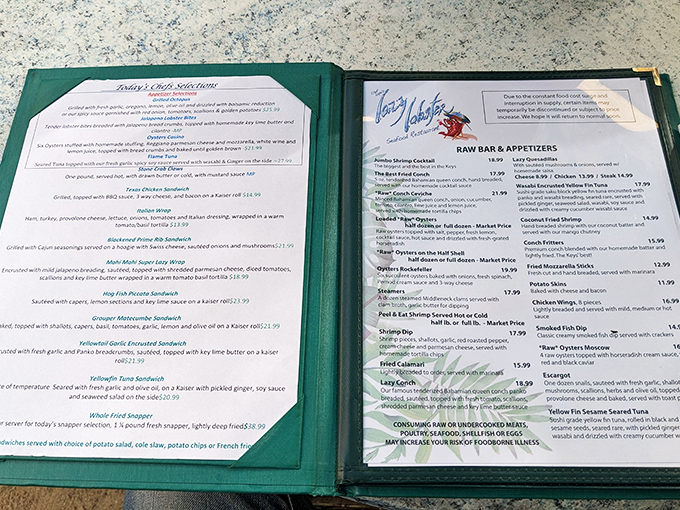 A menu that reads like a love letter to seafood enthusiasts. Each page promises oceanic delights that will have you plotting your return visit before dessert arrives.