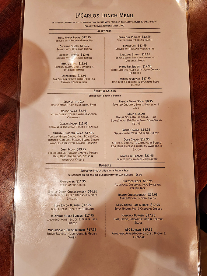 A menu that reads like a love letter to classic American cuisine. Each description promises a dish worth driving those winding roads for.