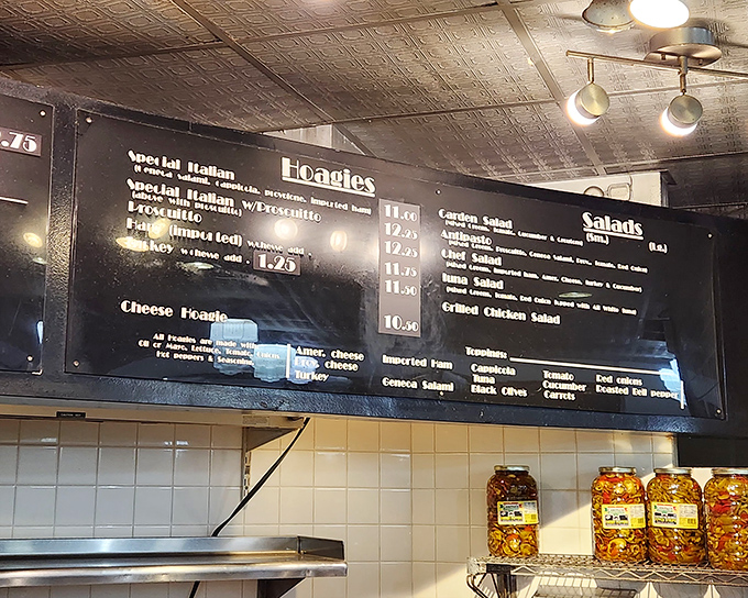 The menu board reads like a love letter to sandwich perfection. Decisions, decisions &ndash; all of them delicious.