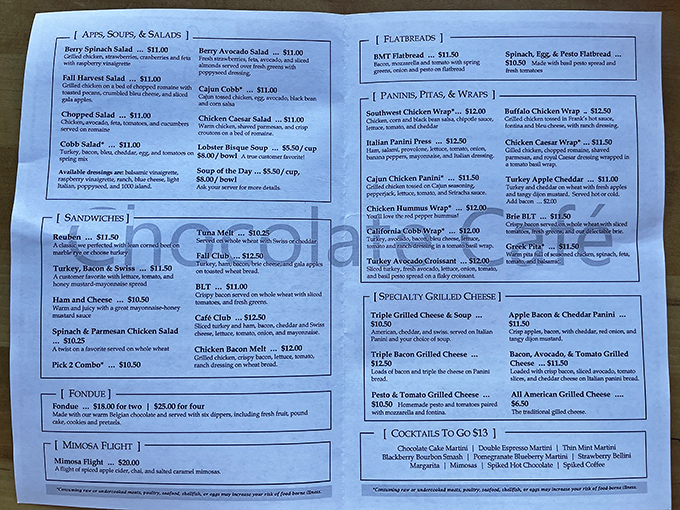 A menu that reads like a love letter to comfort food. Each category promises satisfaction, from grilled cheese symphonies to salads that aren't just obligation eating.