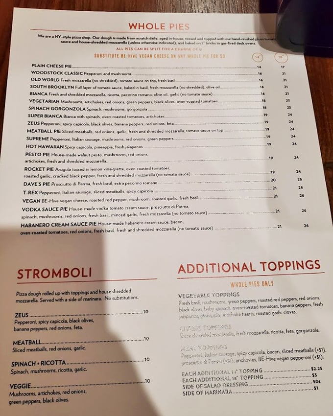 The menu reveals Boston Commons isn't just about fish and chips—their NY-style pizzas, strombolis, and creative pies showcase a kitchen that refuses to be typecast.