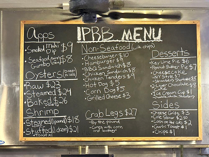 A chalkboard menu that tells you everything you need to know. No fancy fonts or QR codes here—just the promise of seafood bliss.