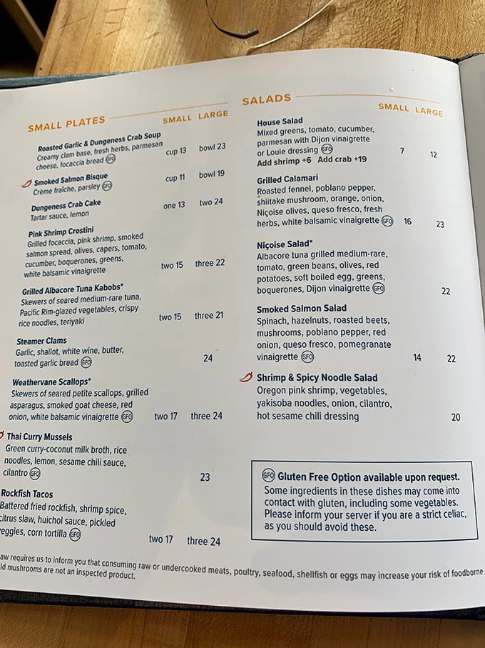 A menu that reads like poetry to seafood lovers. Each description promises ocean-fresh delights that were likely swimming just hours before landing on your plate.