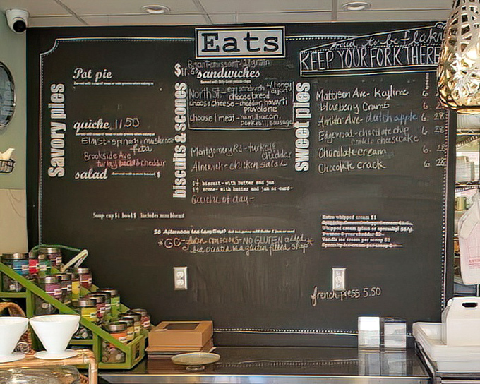 The chalkboard menu reads like poetry for the hungry&mdash;savory pies, quiches, and sweet treasures await your eager fork.