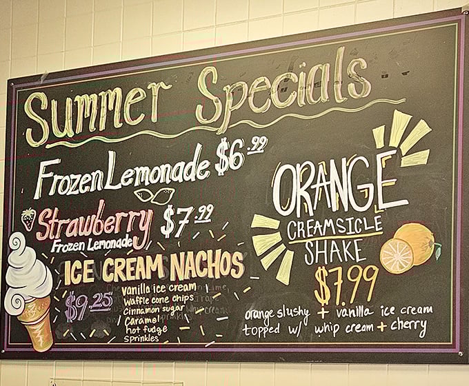 The chalkboard of dreams announces summer's greatest hits: Ice Cream Nachos and Orange Creamsicle Shake stealing the spotlight like headliners at a food festival.