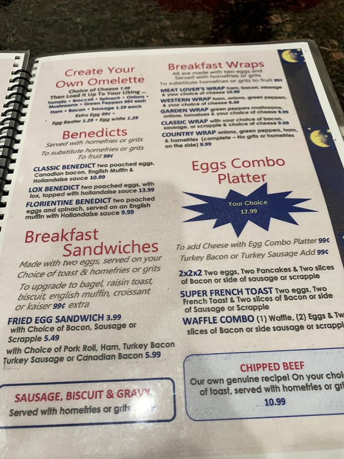 The spiral-bound menu reads like a love letter to breakfast classics. Decision paralysis is the only side effect of these tantalizing options.
