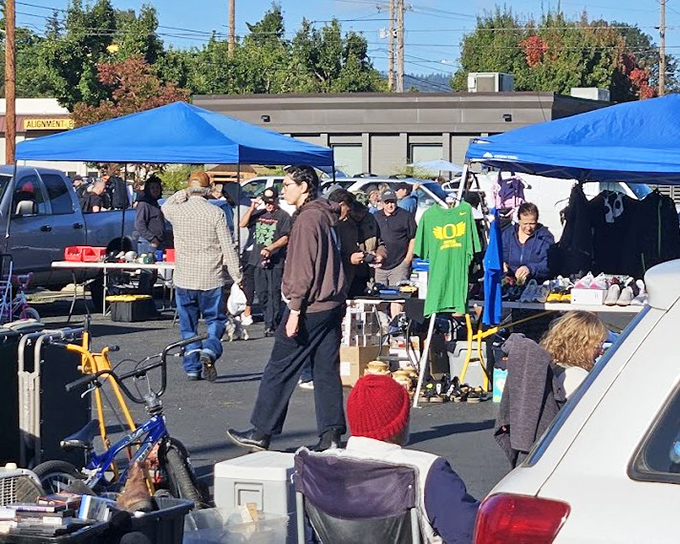 Sunshine and blue canopies create the perfect backdrop for discovery. That Oregon Ducks shirt might just find a new home today!