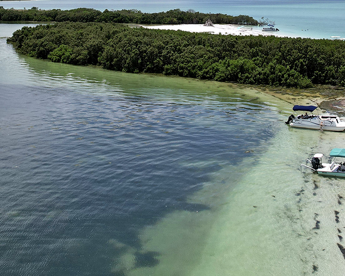 Mother Nature's waterfront property, where boats anchor in waters so clear you can count sand dollars without getting wet.