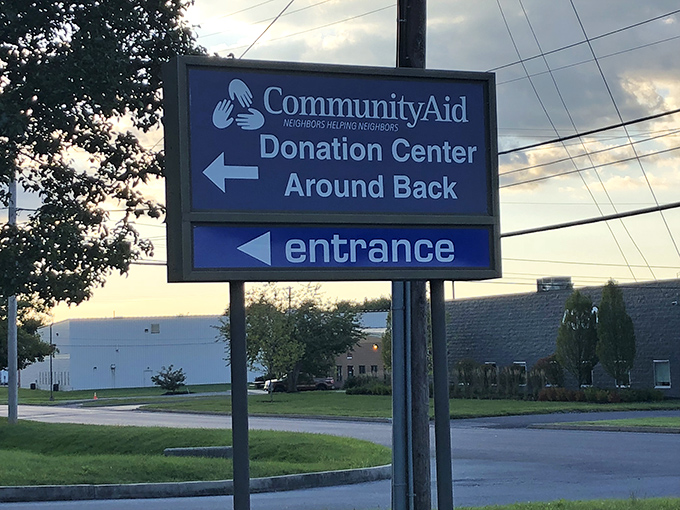 The sign that promises both bargains and good karma. Follow the arrows to shopping salvation and the warm glow of charitable giving.