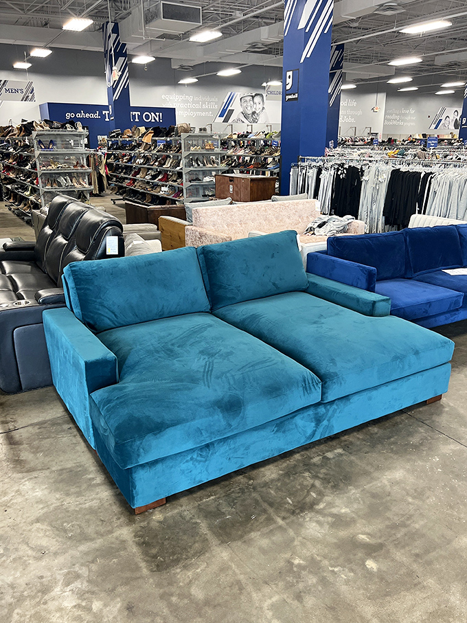 That teal velvet sectional isn't just a sofa&mdash;it's someone's future "I can't believe I got this for THAT price" humble-brag story waiting to happen.