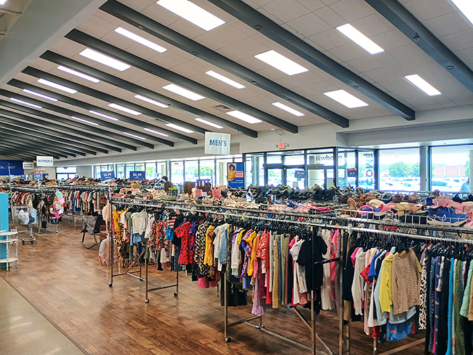 A rainbow sea of possibilities hangs from rack after rack. Each garment waits patiently for its second chance at fashion glory.