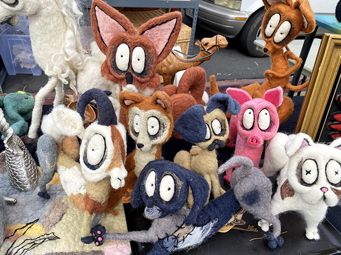 These wide-eyed felt creatures aren't judging your purchases&mdash;they're silently begging you to rescue them from their table of misfit toys.