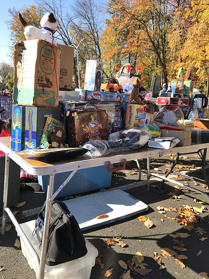 Nostalgia towers reach skyward as vintage toys await their second chance at bringing joy. That Snoopy figure? Someone's childhood memory about to become another's treasure.
