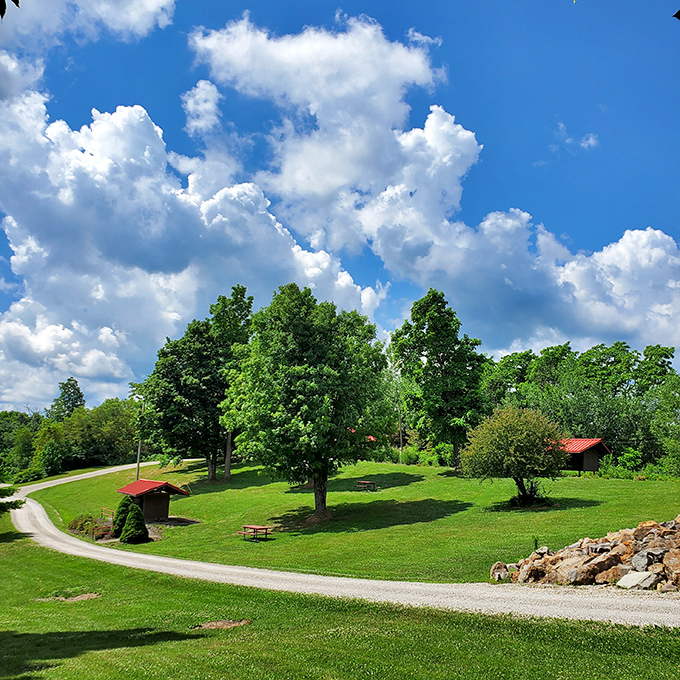 Nature reclaims what industry once dominated. The peaceful park setting offers a striking contrast to the bucket's industrial origins.