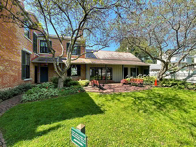 The Castle's grounds offer a peaceful retreat where history and nature harmonize. That bench is practically begging for a contemplative sit.