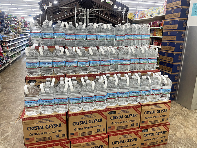 Hydration doesn't have to break the bank. This Crystal Geyser display proves that staying refreshed is one of life's more affordable luxuries.