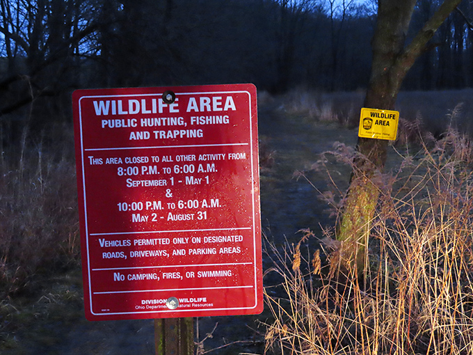 This sign isn't kidding around. Nature has office hours too, and sometimes they include "closed for hunting season."