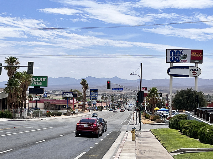 Palm trees line Barstow's main drag, where Route 66 nostalgia meets desert affordability. Who says California dreams require a fortune?