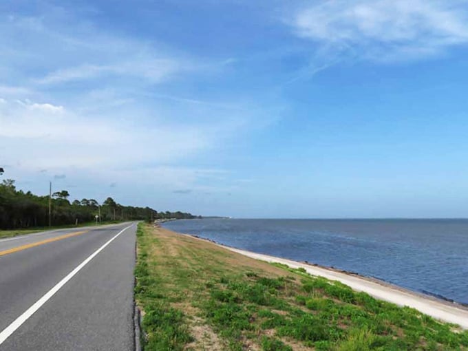 The Big Bend Scenic Byway hugs the coastline like an old friend, offering water views that would make Poseidon jealous.