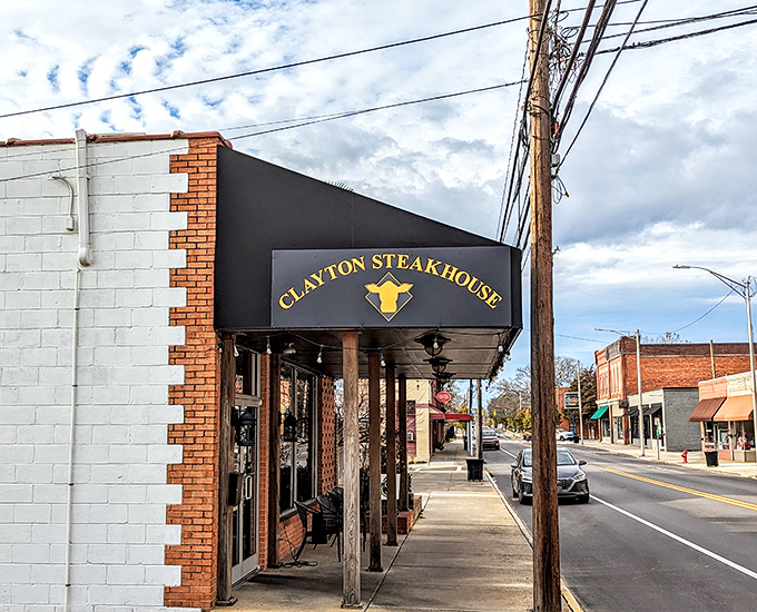 Downtown charm meets meat-lover's dream at Clayton Steakhouse. This unassuming storefront hides flavor bombs waiting to detonate on your taste buds.