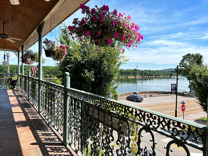 Clifton's wrought-iron balconies drip with vibrant flowers, creating the perfect perch for watching river life unfold below.