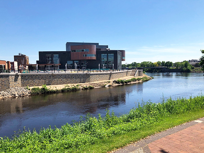 The Chippewa River flows past Eau Claire's cultural heart, where brick meets water in perfect harmony.