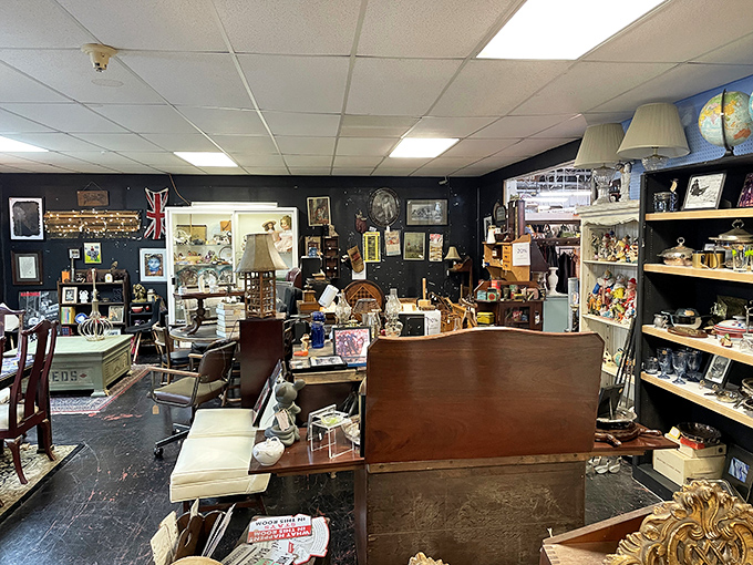 Dark walls make the treasures pop at Goodlettsville Antique Mall. It's like a museum where everything's for sale!