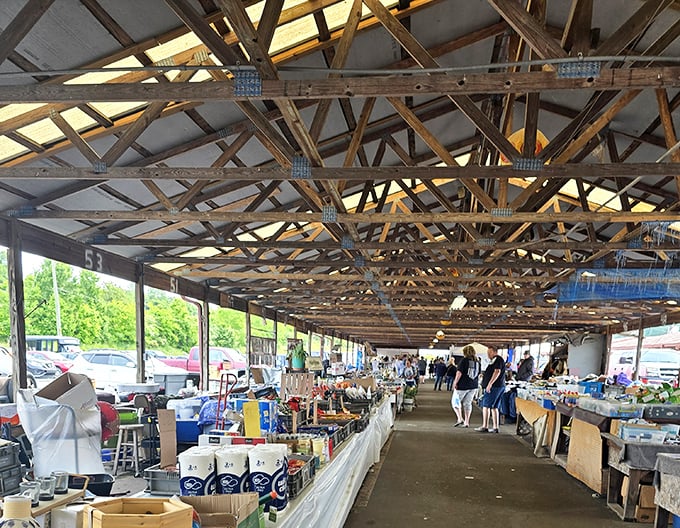 Great Smokies Flea Market's bustling indoor aisles - where "just browsing" becomes "how am I going to fit this in my car?" in record time.