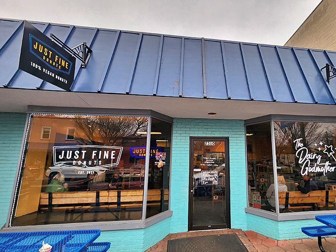 Just Fine Donuts' turquoise façade pops against the sky – a colorful hint at the creative vegan treats waiting inside.