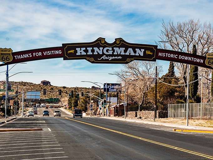 Kingman's Route 66 heritage shines through its welcoming arch, inviting retirees to settle where nostalgia meets affordability.
