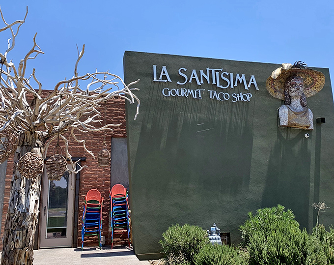 La Santisima's bold green exterior and artistic flair signal this isn't your abuela's taco shop. Culinary adventure awaits behind that door.