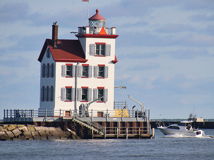 Lorain's "wedding cake" lighthouse stands proudly at the harbor entrance. No boat? No problem—binoculars bring this beauty closer!