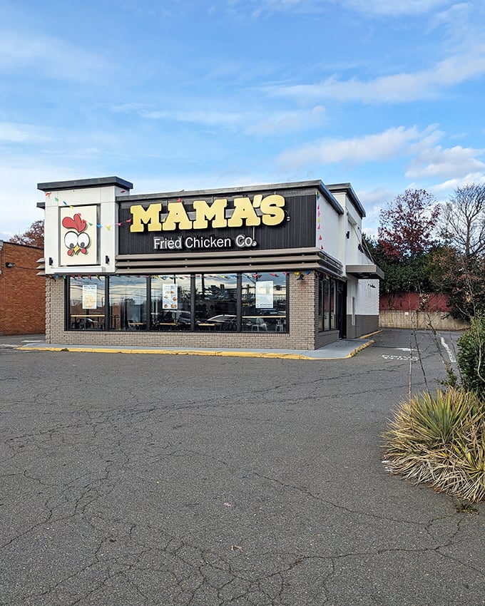 That cartoon chicken mascot knows something you don't—this place makes fried chicken worth crossing roads for.
