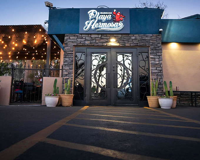 Twilight transforms Playa Hermosa into a magical portal to Mexico's coastline. Those ornate doors open to seafood paradise!