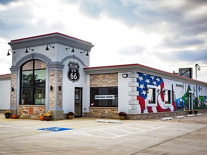 Old Route 66 Family Restaurant wears its heritage proudly with that stunning stone and flag mural.