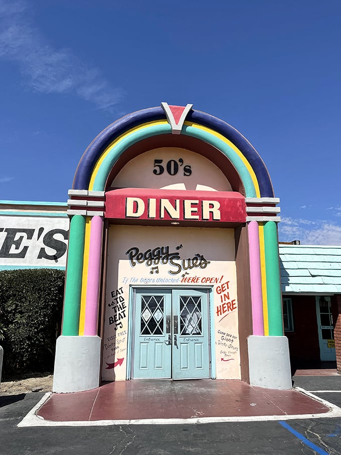 Peggy Sue's rainbow entrance arch isn't subtle, but neither are their pancakes. This desert oasis screams "the 1950s called and they're serving breakfast!"