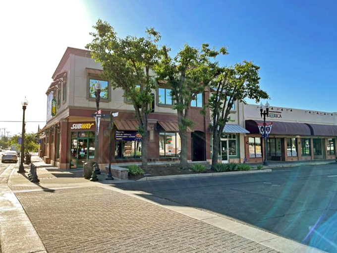 Porterville's downtown invites leisurely strolls where mountain views frame the horizon and small-town life unfolds at its own pace.
