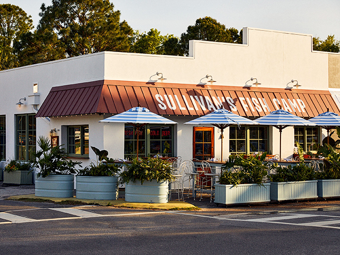 Sullivan's Fish Camp brings a splash of coastal chic to island dining. Blue umbrellas and fresh catches await!