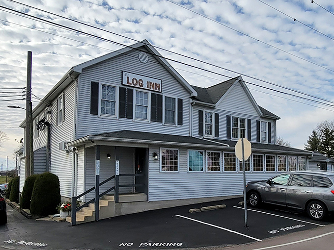 The Log Inn stands proudly in its white clapboard glory. This historic spot has been satisfying hungry Hoosiers longer than most of us have been alive.