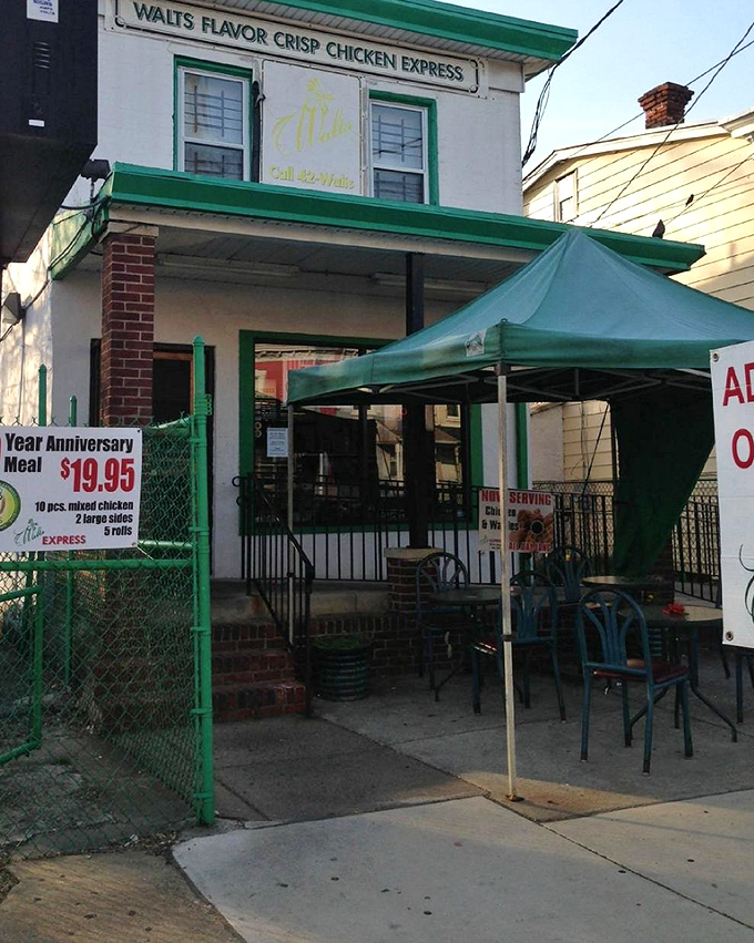 The green trim and brick facade hint at the crispy treasures waiting inside this neighborhood gem. 