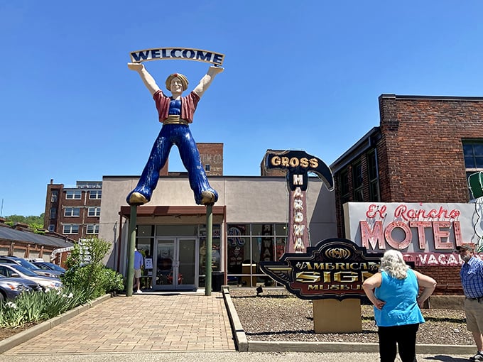Vintage signs glow with the warm nostalgia of roadside Americana. Remember when every motel promised color TV?