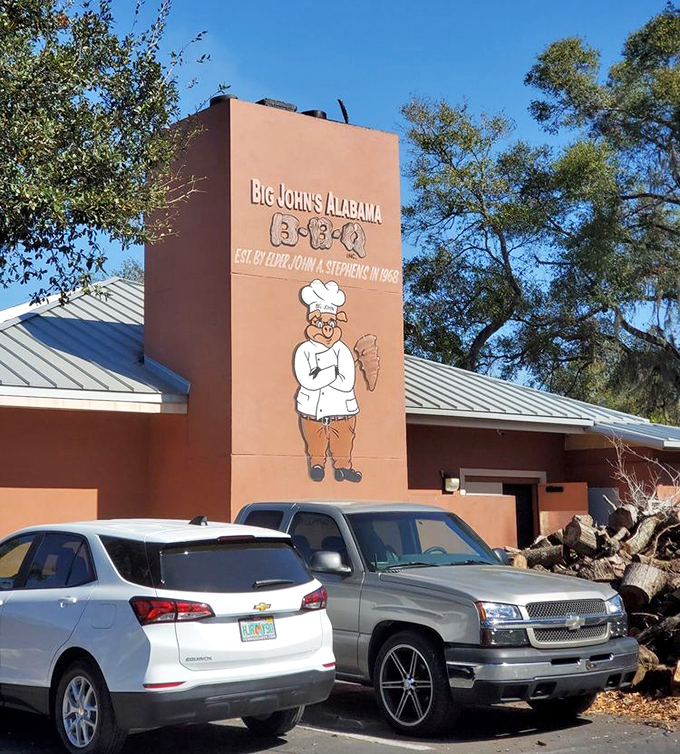 That chef on the sign knows what you're thinking: "Yes, the barbecue really is that good."