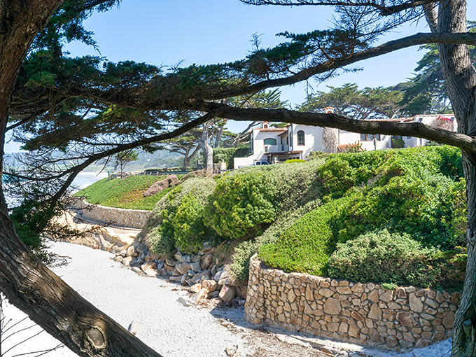 Stone walls and lush gardens in Carmel create the kind of curb appeal that makes you wonder if fairy tales use this as their reference material.