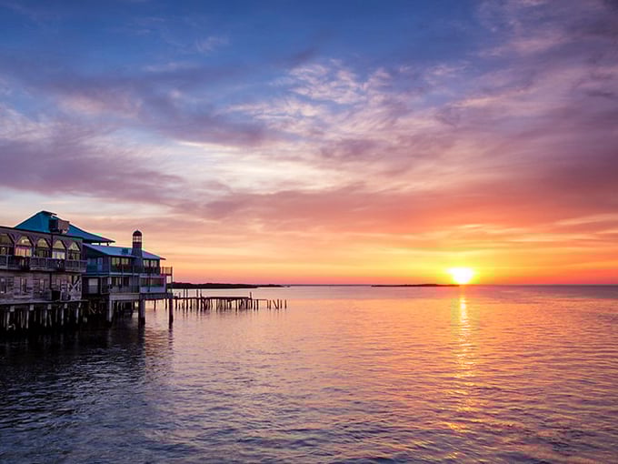 Mother Nature puts on her nightly art show as the sun dips below the horizon, painting the sky in impossible colors.