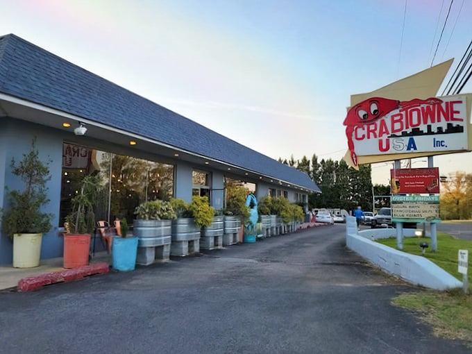Crabtowne USA: Blue building, potted plants, and a sign that promises crab paradise. Sometimes the simplest places hide the biggest flavors.