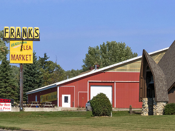 The classic red barn exterior hints at the organized chaos of vintage finds waiting patiently inside.